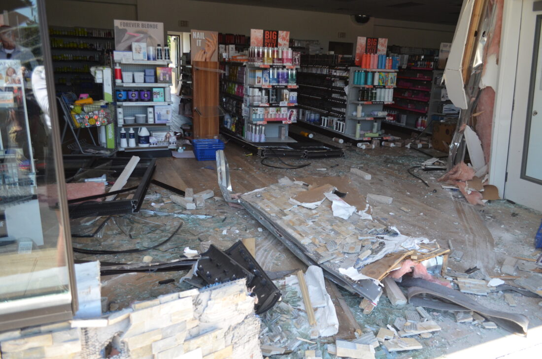 Vehicle crashes into storefront | News, Sports, Jobs - The Mining Journal